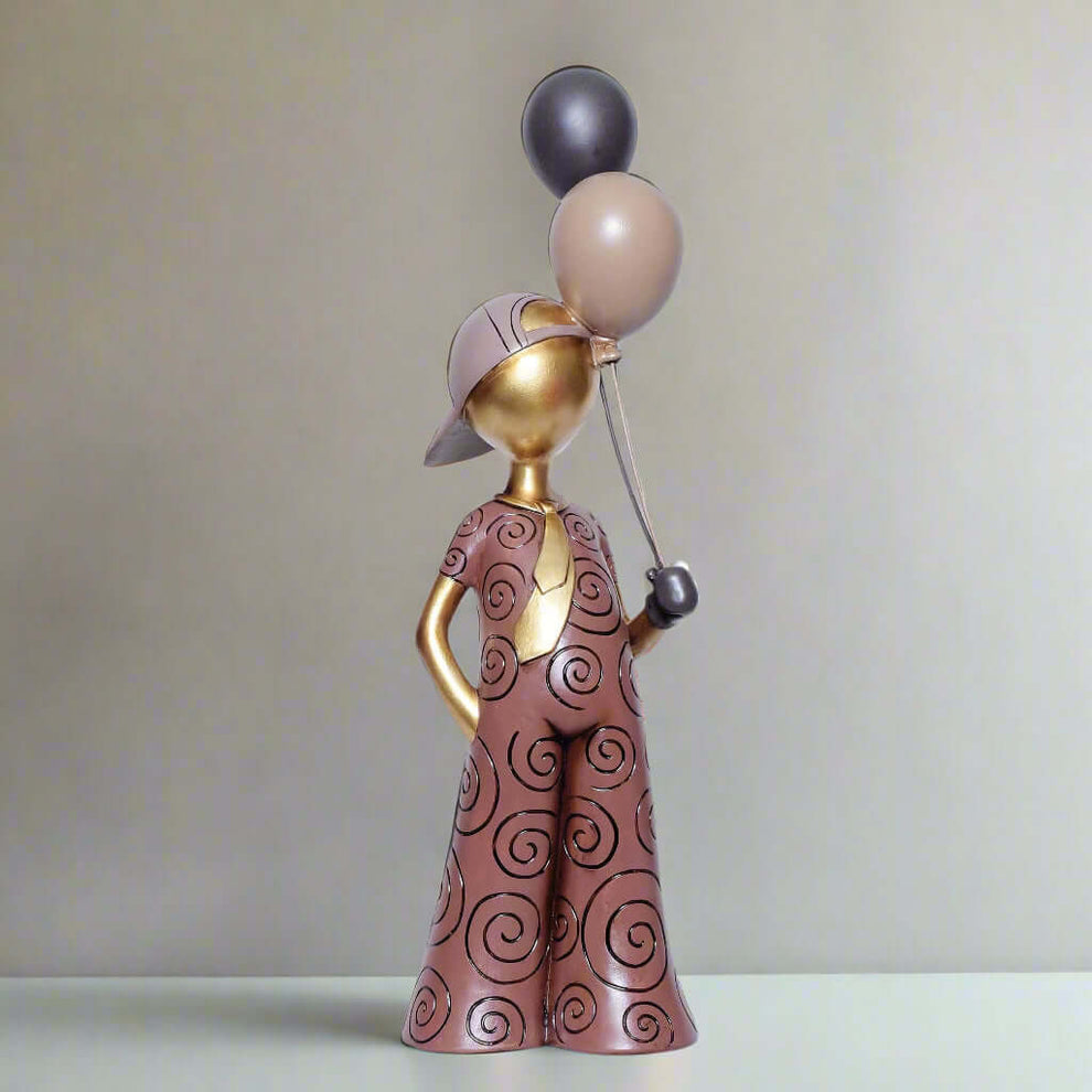 Warm Earth Whimsy: Spiraled Figurine with Celebration Balloons – Le ...